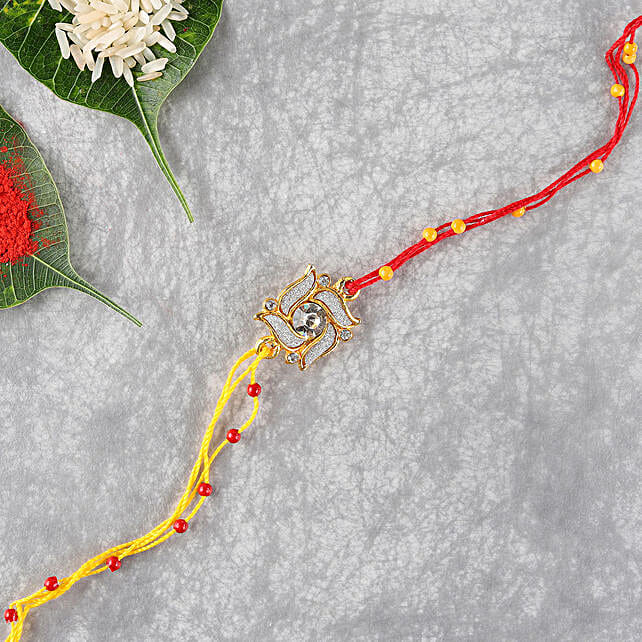 Dazzling Swastika Rakhi usa | Gift Dazzling Swastika Rakhi- FNP