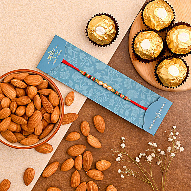 Golden Pearl Rakhi And Almonds With Ferrero Rocher usa | Gift Golden ...
