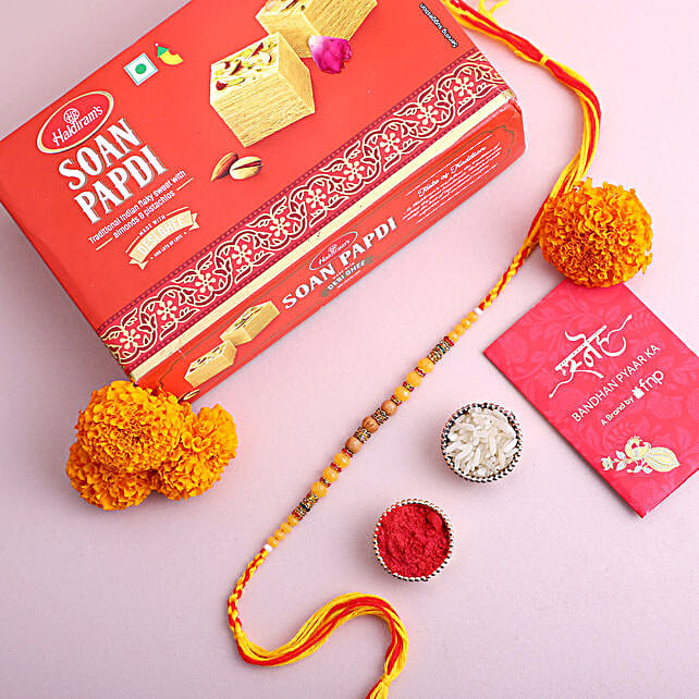 Vibrant Yellow Designer Rakhi & Soan Papdi usa | Gift Vibrant Yellow ...