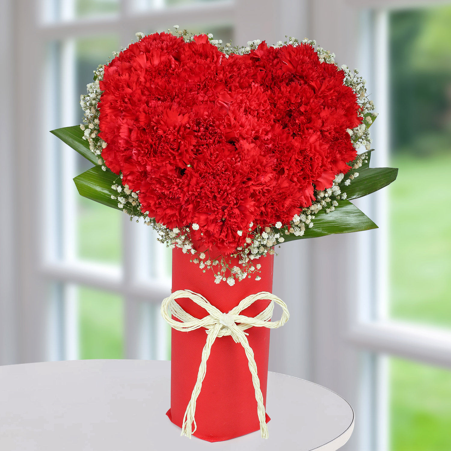 Buy/Send Red Carnation Heart Arrangement Online- Ferns N Petals