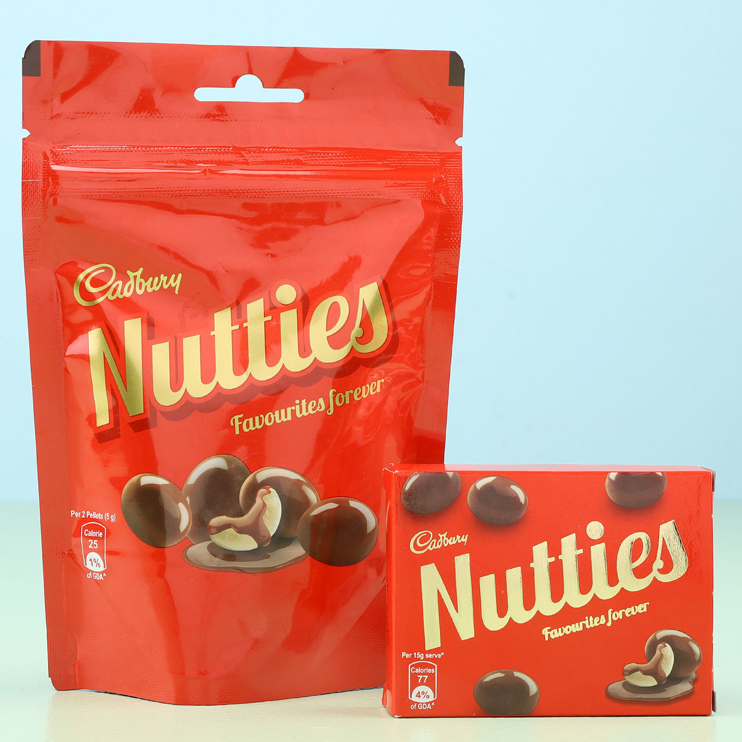 Buy/Send Cadbury Nutties & Designer Rakhi Combo Online- Ferns N Petals